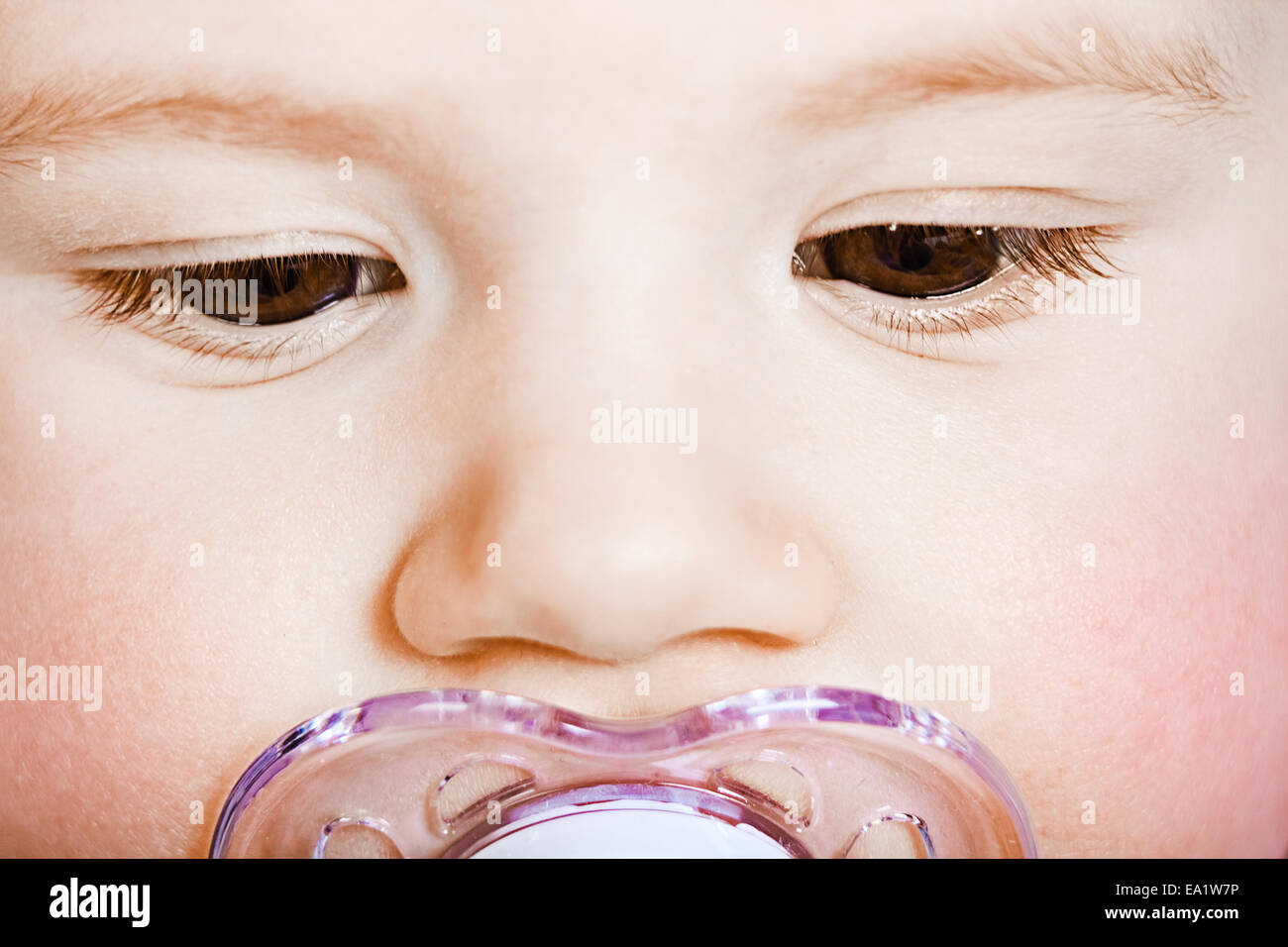face baby with pacifier closeup. macro Stock Photo - Alamy