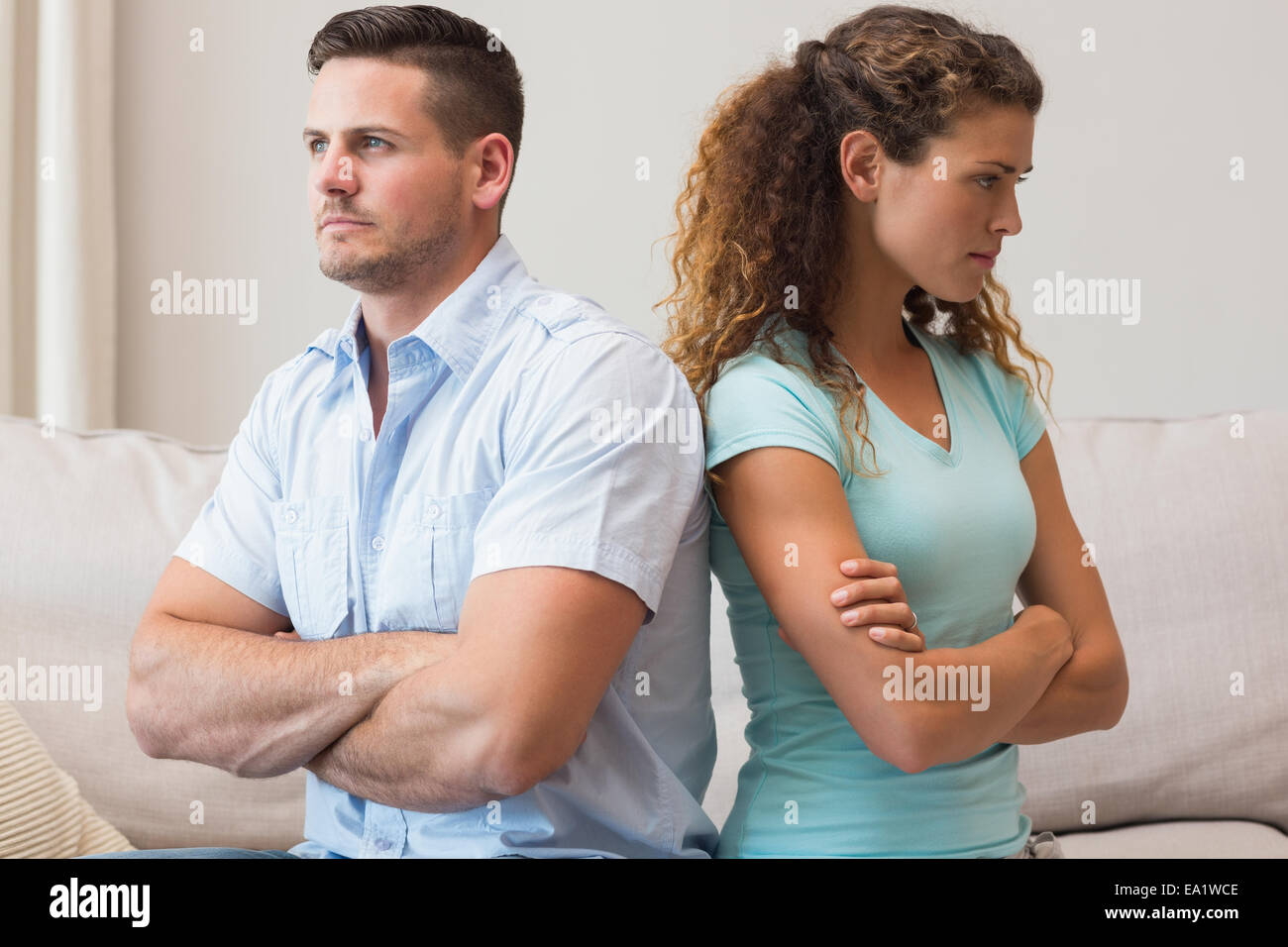 Couple quarreling in sitting room Stock Photo - Alamy