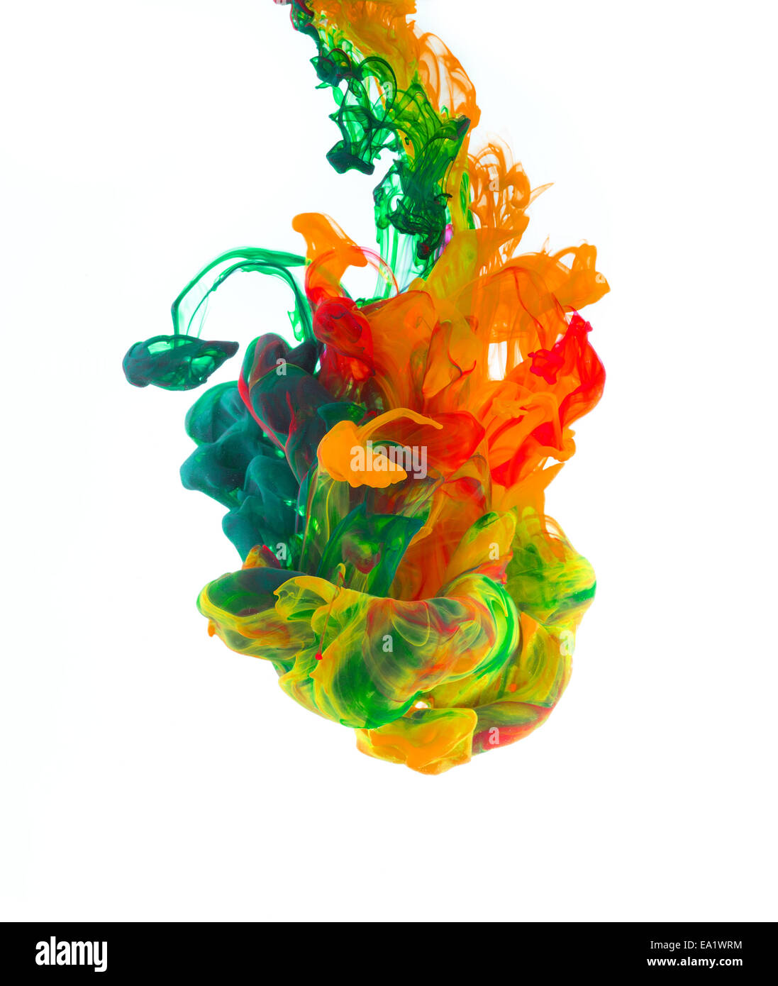 Studio shot of colored ink in water, isolated on white background Stock ...