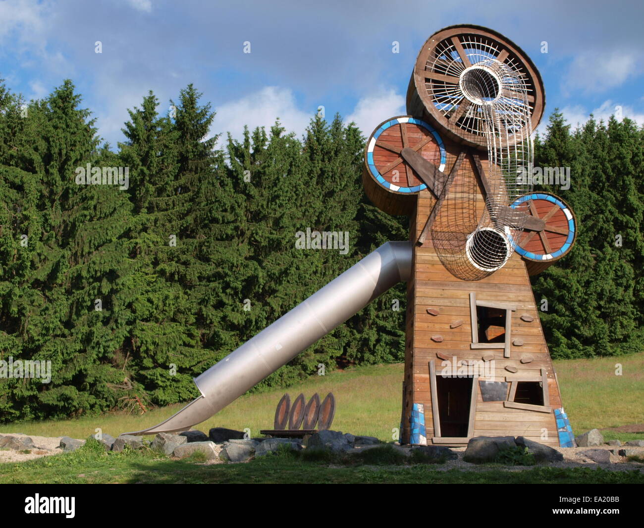 Playground with climbing tower and slide Stock Photo - Alamy