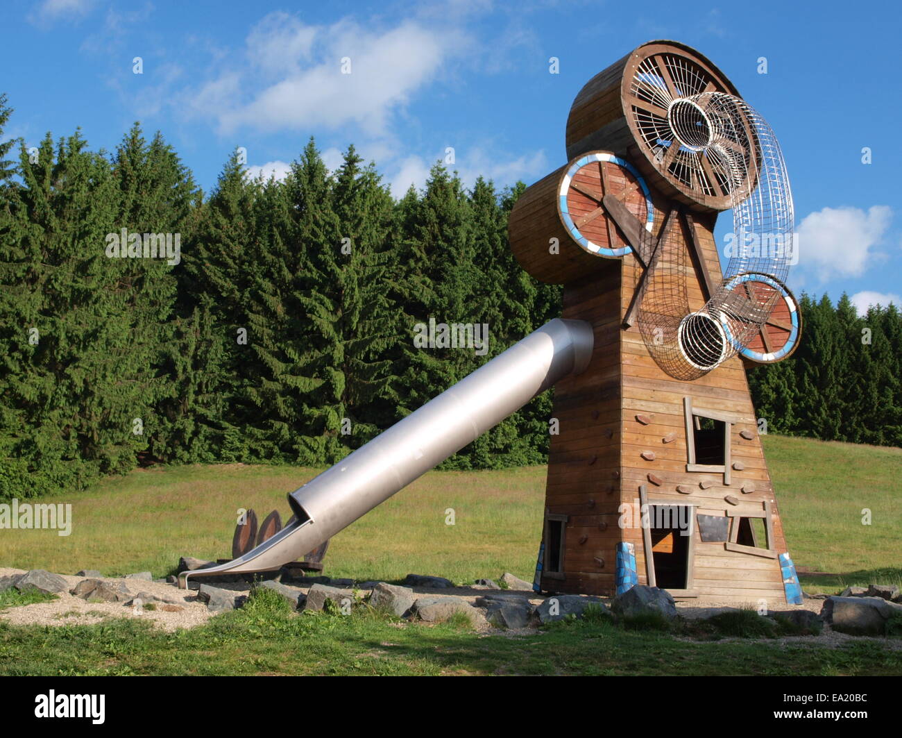 Playground with climbing tower and slide Stock Photo - Alamy