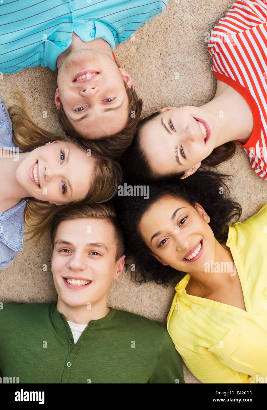 Friends lying down hi-res stock photography and images - Alamy
