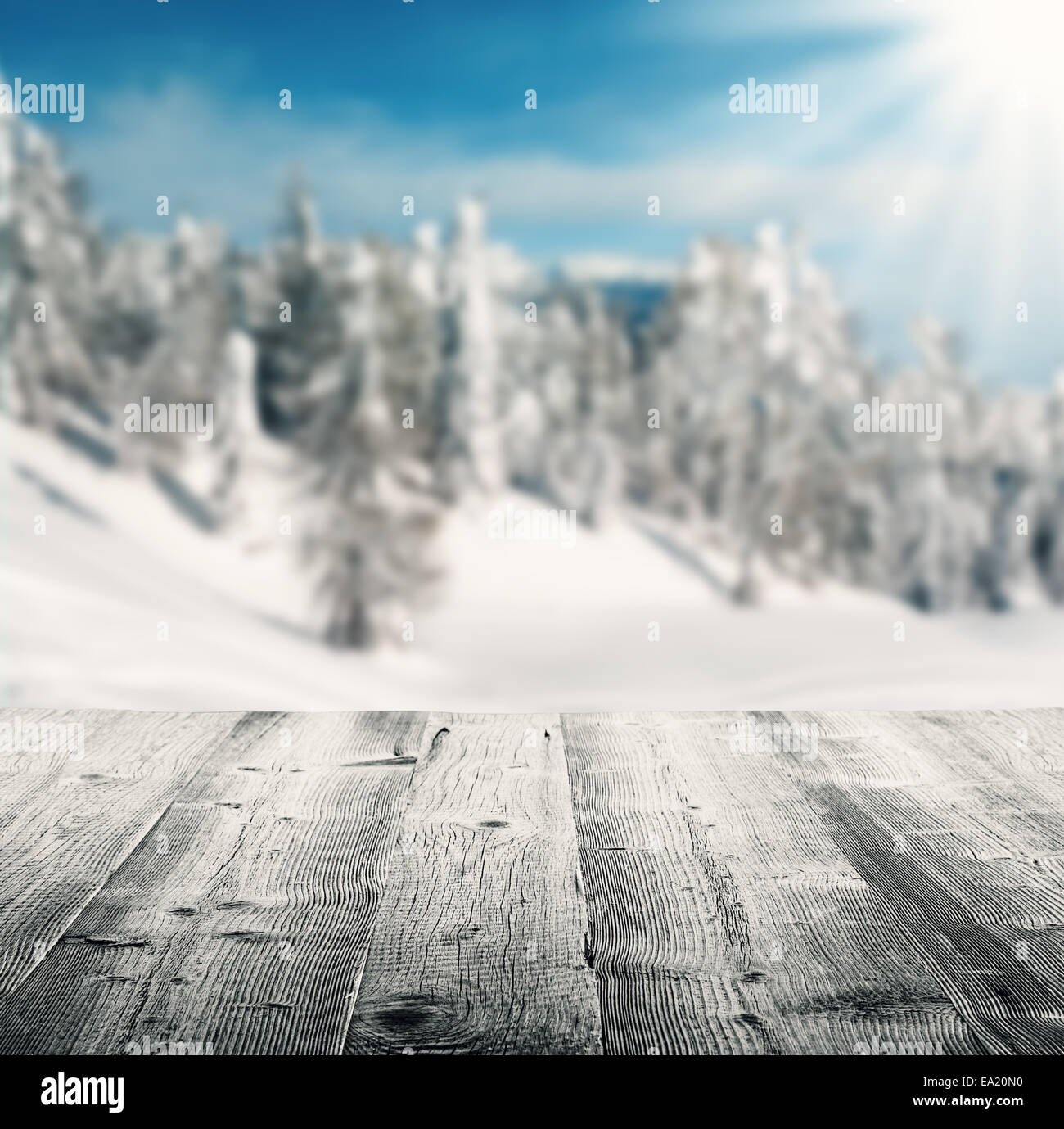 Snowy winter landscape with empty wooden planks Stock Photo - Alamy
