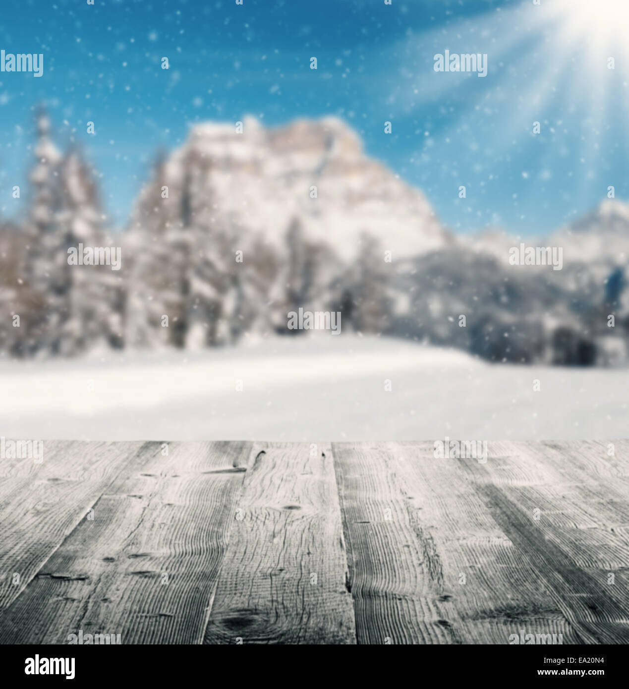 Snowy winter landscape with empty wooden planks Stock Photo - Alamy