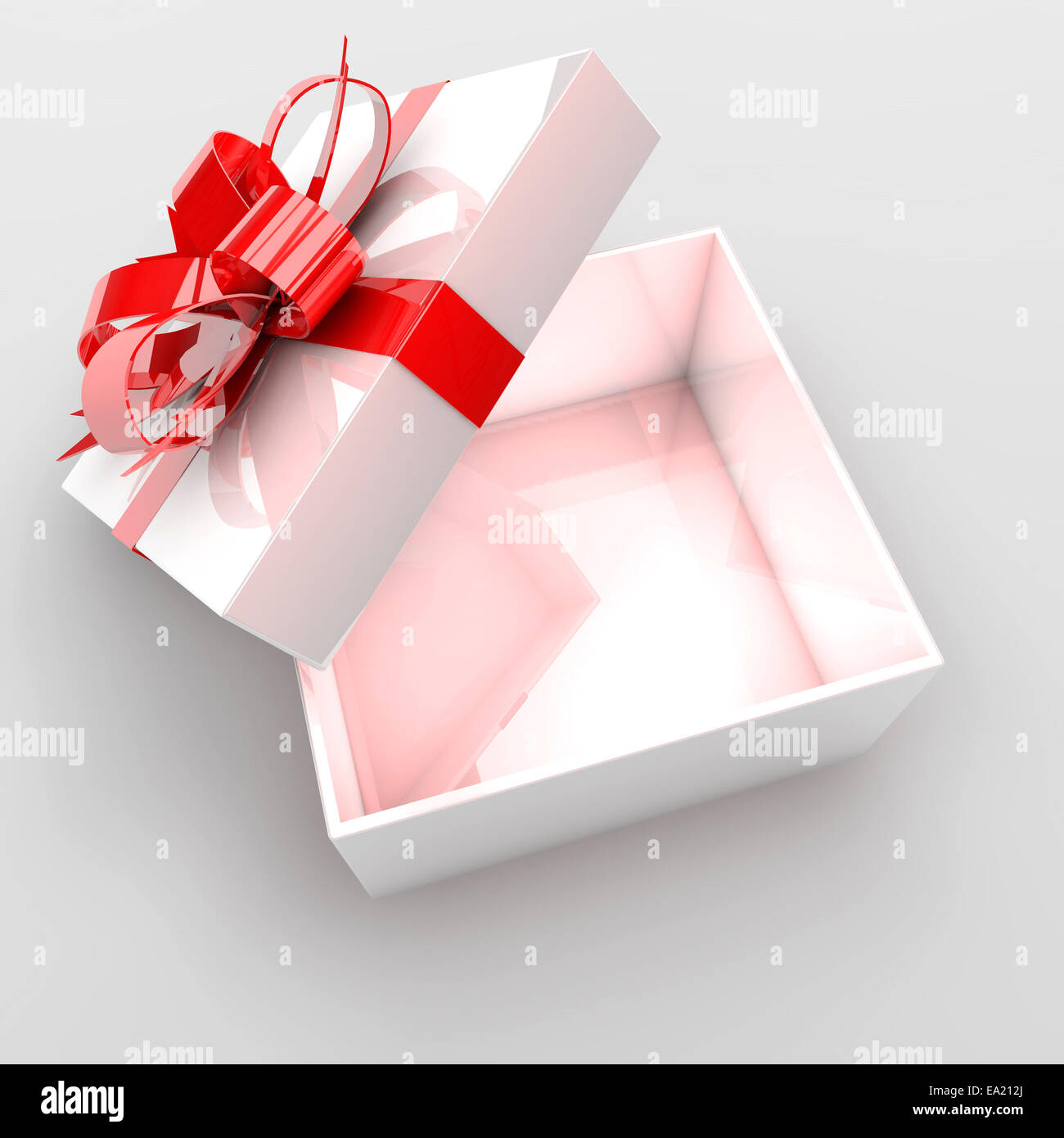 Open gift box with red bow Stock Photo - Alamy