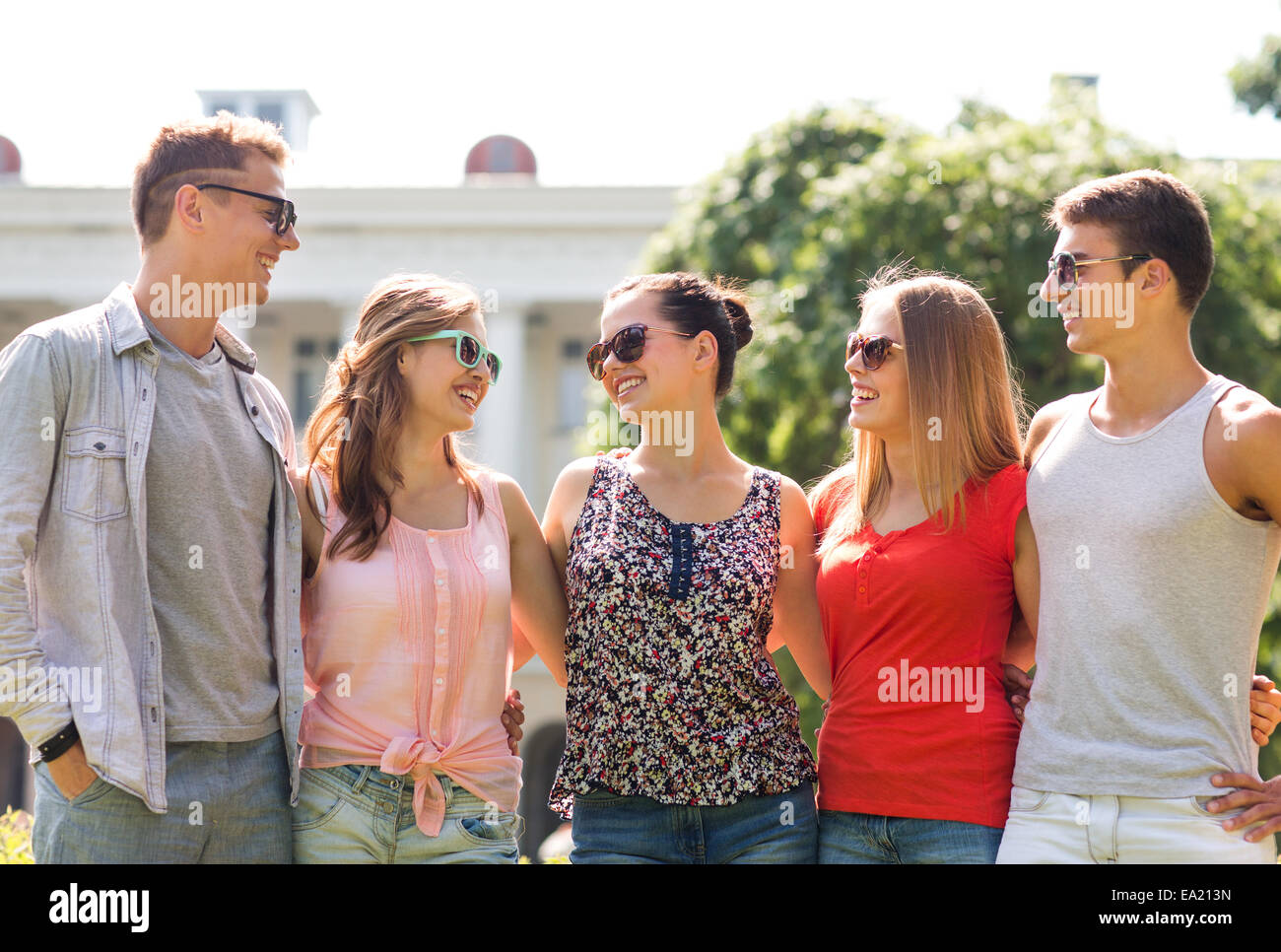 group of smiling friends outdoors Stock Photo - Alamy