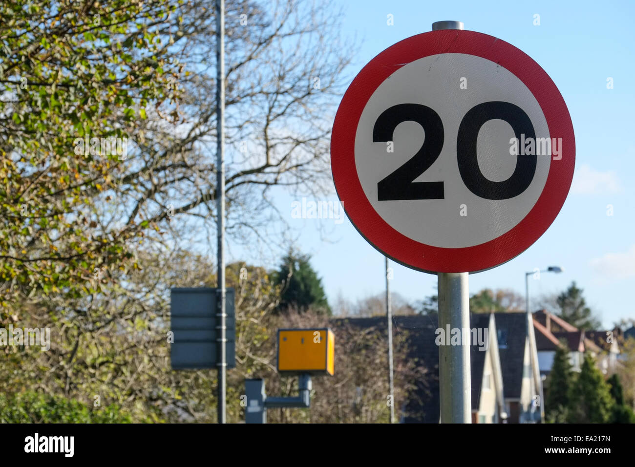 20mph speed limit sign in built up area with speed camera Stock Photo ...
