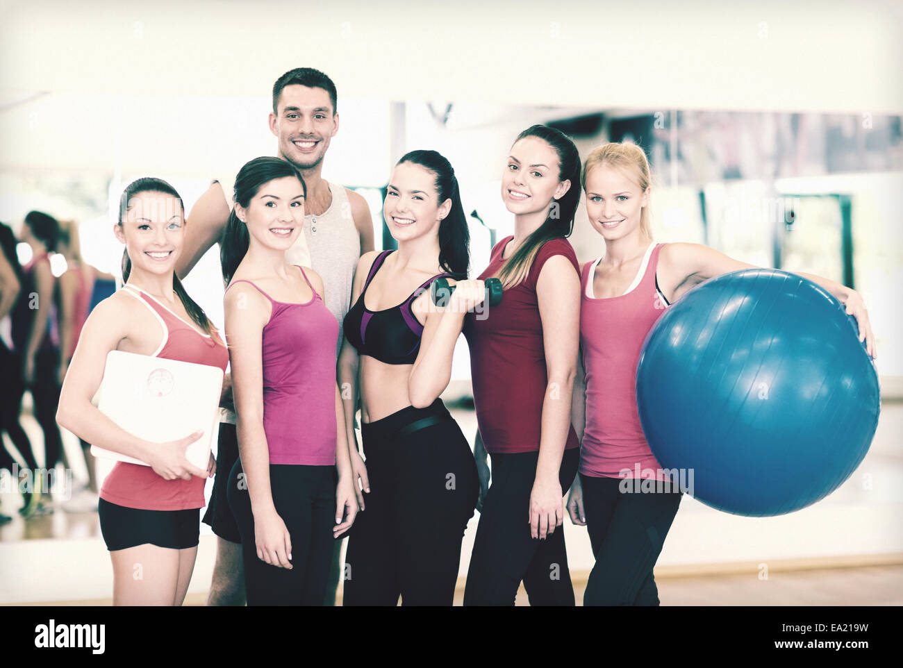 group of smiling people in the gym Stock Photo - Alamy