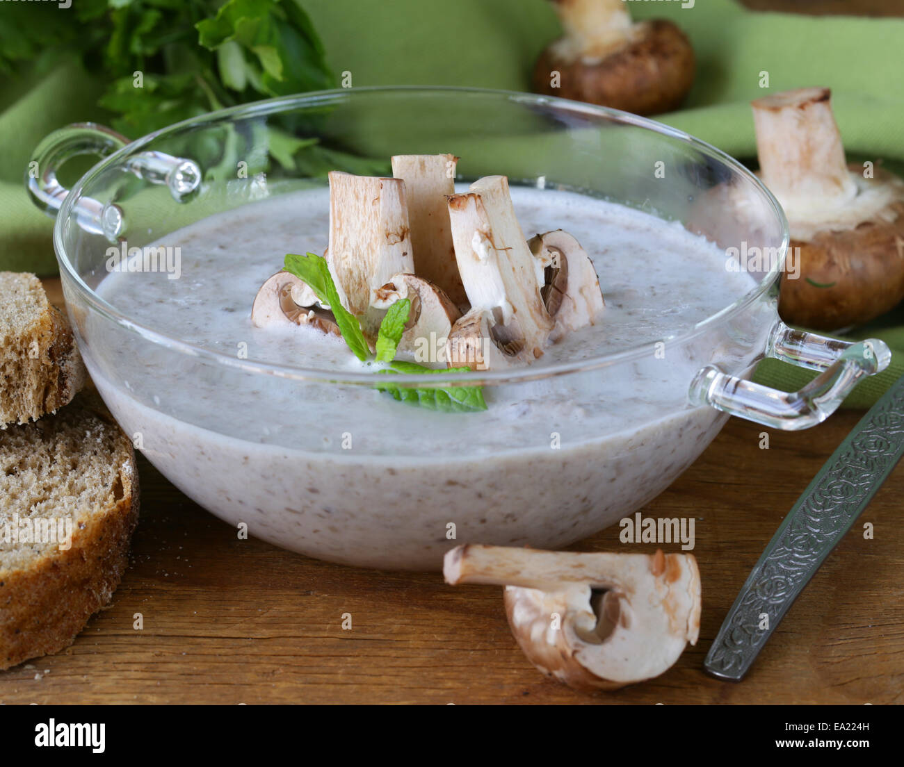 mushroom soup puree with fresh champignons and parsley Stock Photo - Alamy