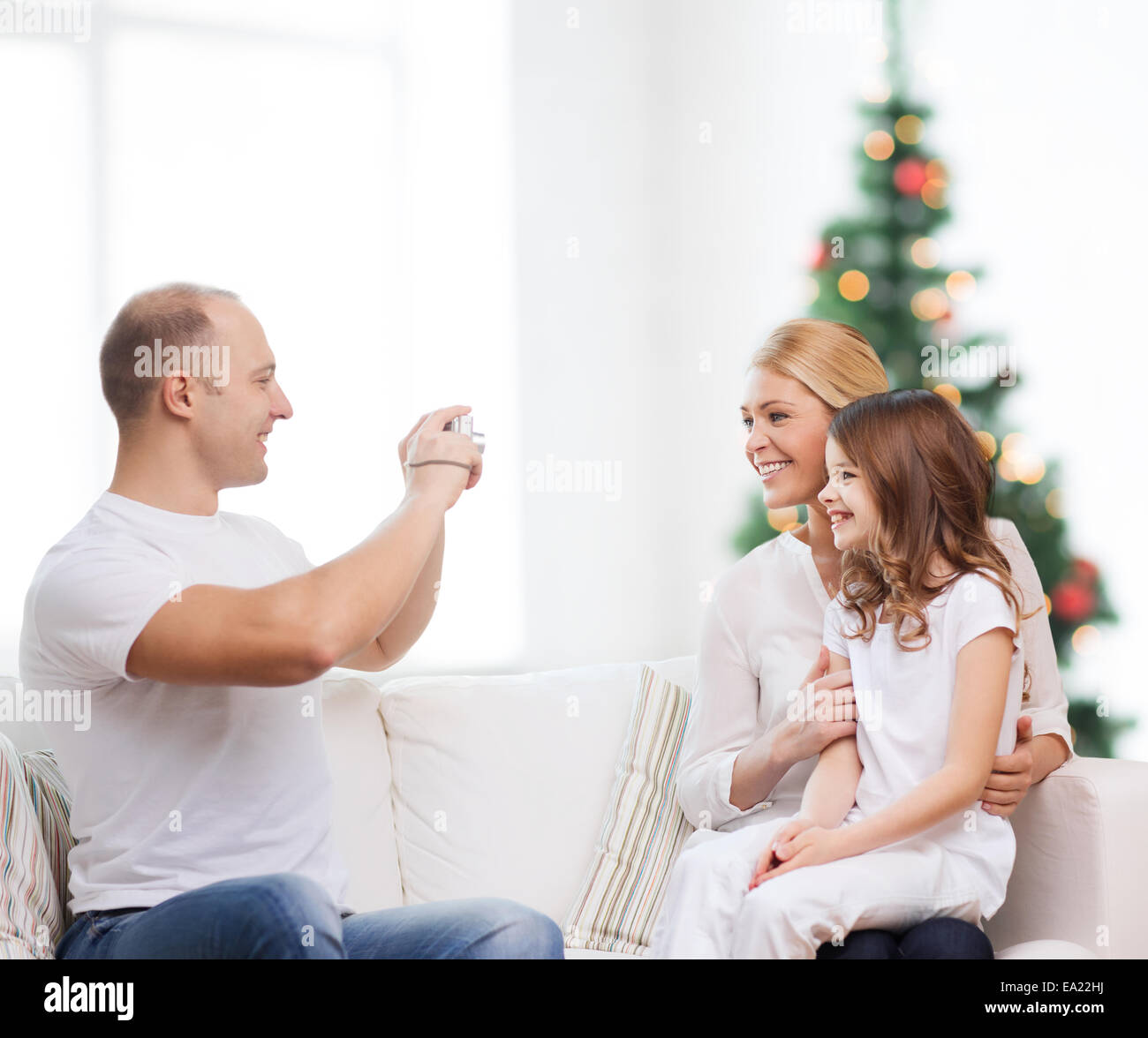 happy family with camera at home Stock Photo - Alamy