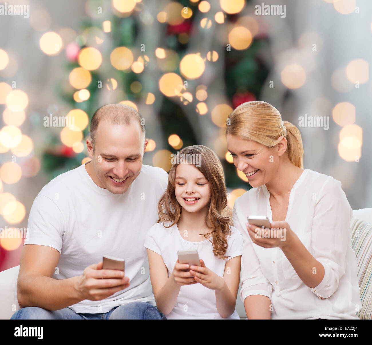 happy family with smartphones Stock Photo - Alamy