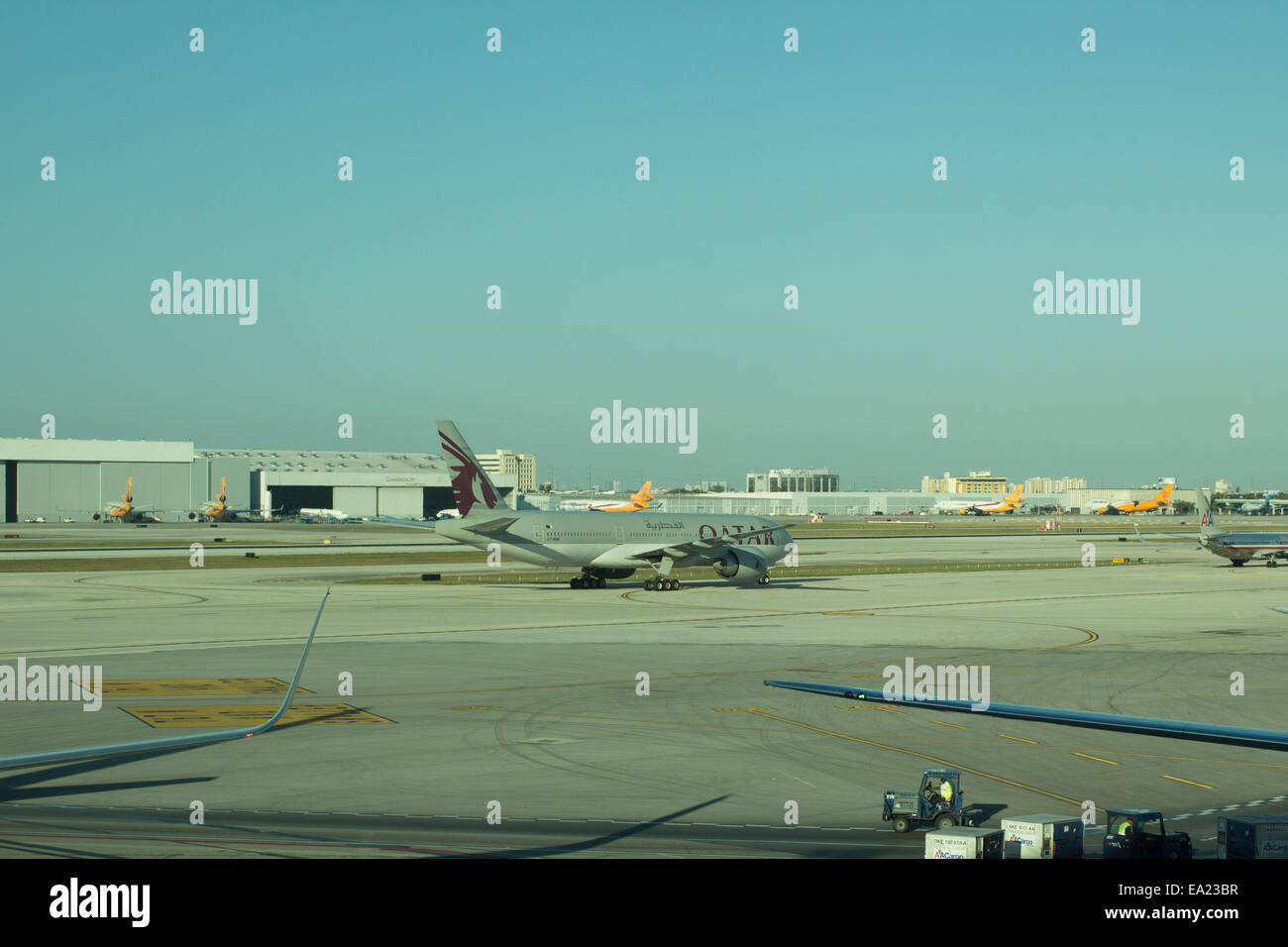A Qatar jet taxiing on the runway at Miami International Airport (MIA ...