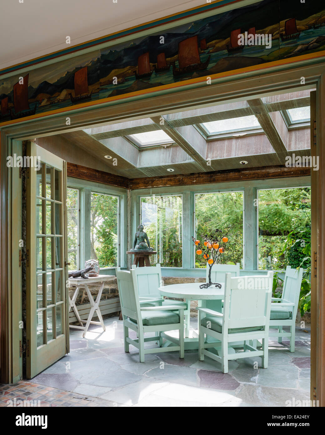 View through open double doors to conservatory with celadon coloured ...