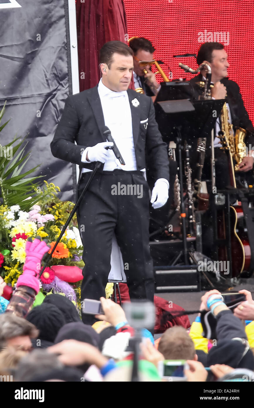 Robbie Williams performing live on stage during the 'Top Of The ...