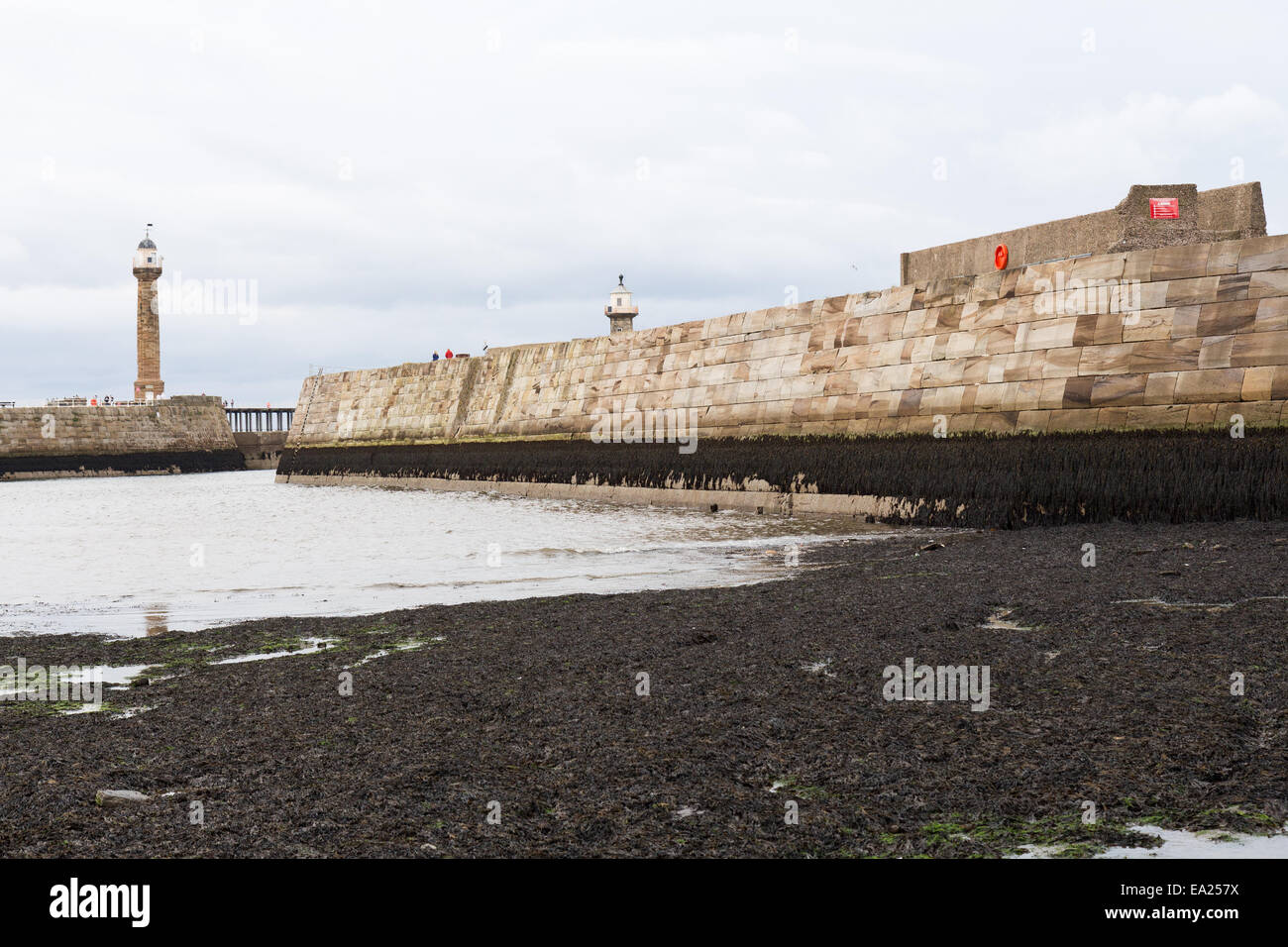 Whitby harbour looking east pier wall, North Yorkshire, England Stock ...