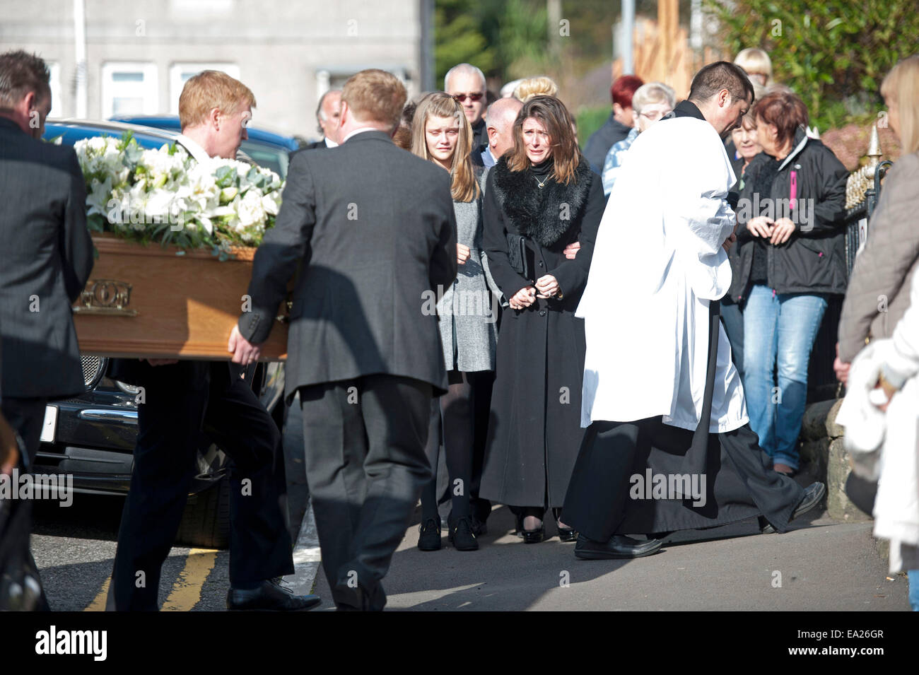 Swansea, Wales, UK. 05th Nov, 2014. Julie Paton watches the coffin of ...