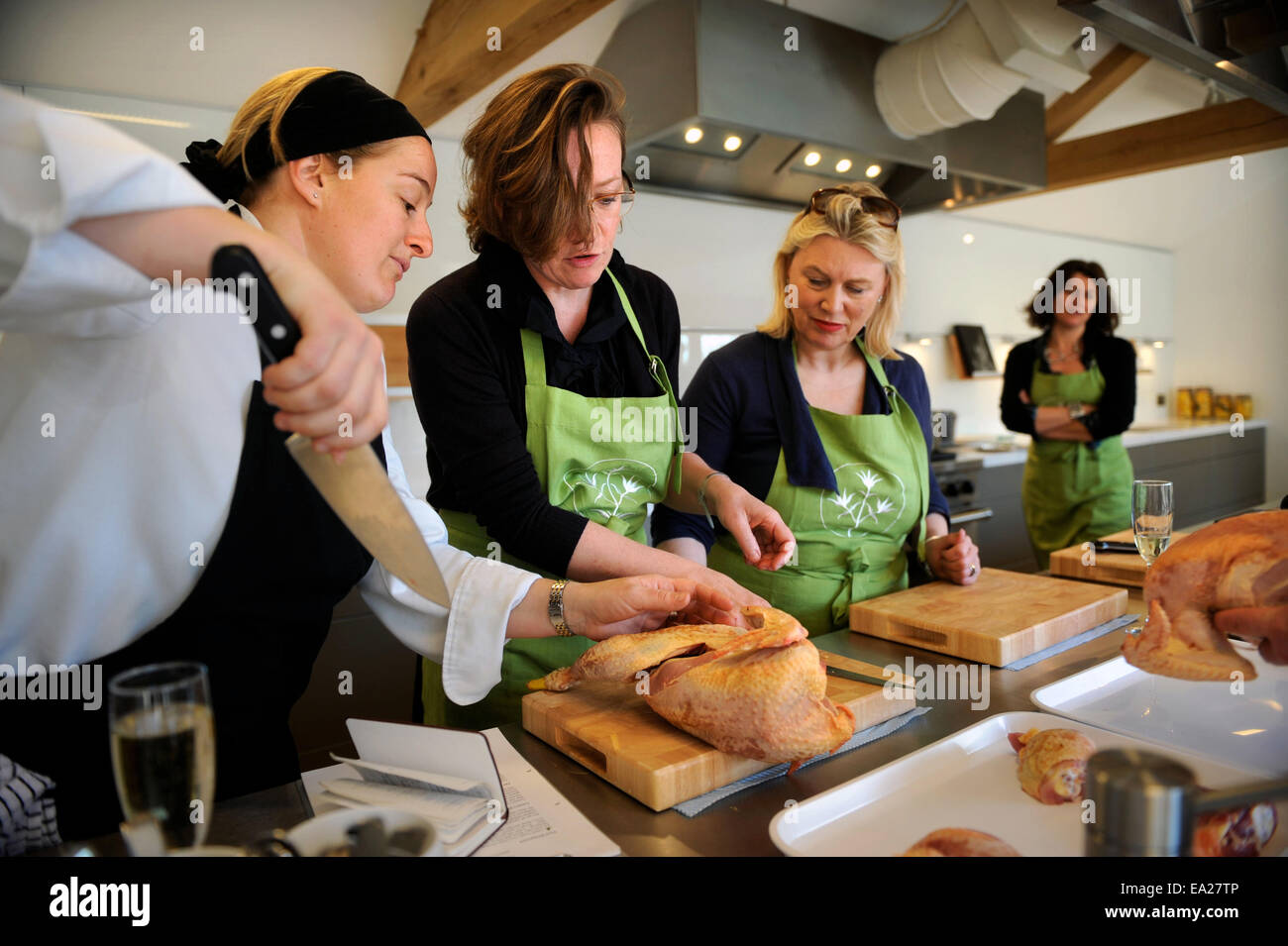 Learning how to chop up a chicken during a cookery course at Thyme at ...