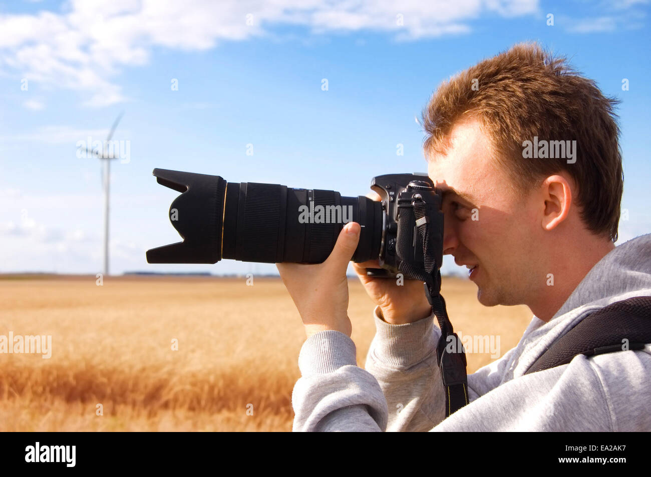 Professional photographer taking pictures Stock Photo - Alamy
