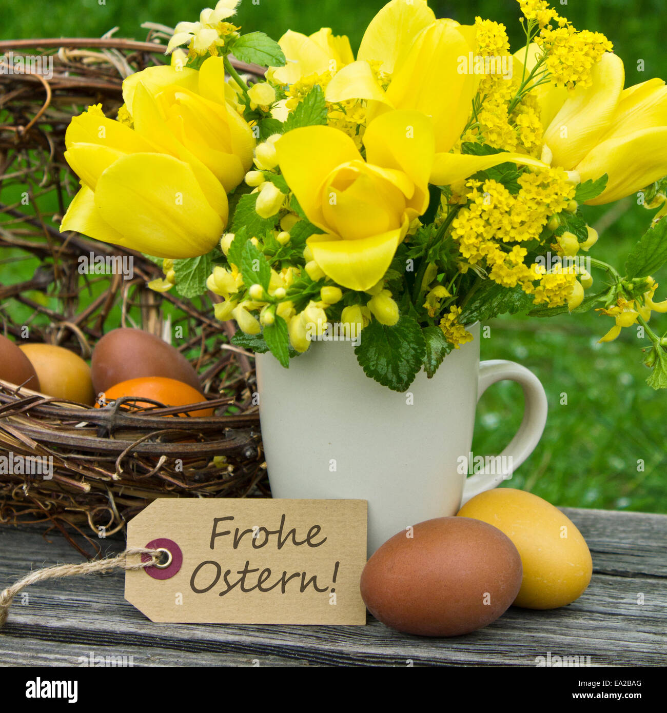 german Easter card with yellow tulips and eggs Stock Photo - Alamy