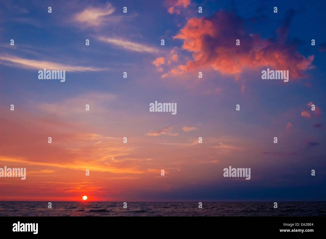 Sundown over the sea Stock Photo - Alamy