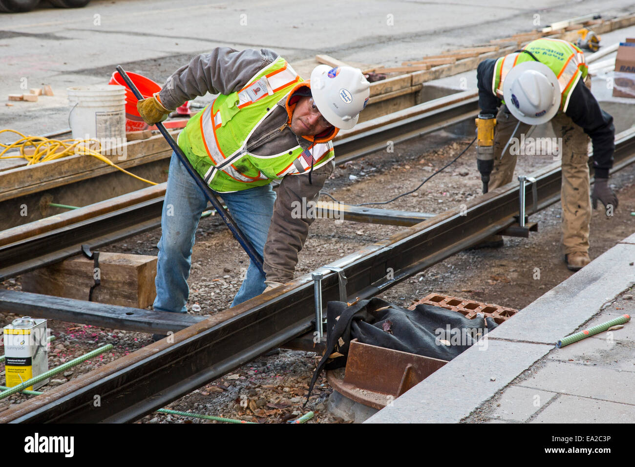 Detroit, Michigan - Workers install rails for 3.3-mile M1 Rail project ...