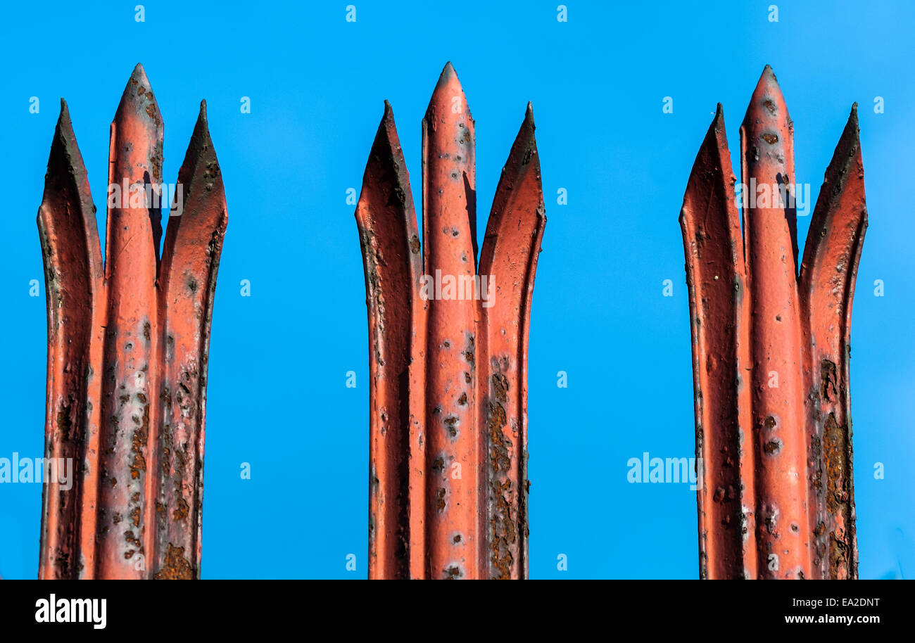 Security spikes barrier with rust Stock Photo - Alamy