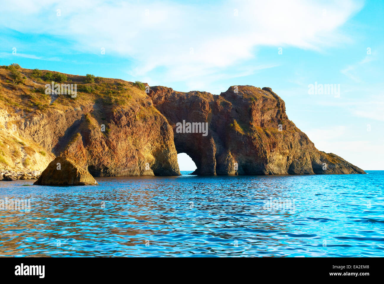 Sea landscape with grotto in the rock Stock Photo - Alamy