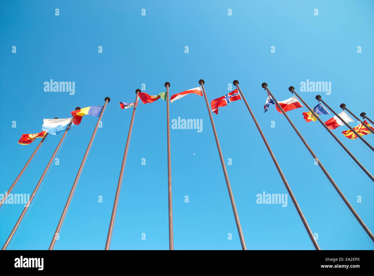 Row of european flags against blue sky background Stock Photo - Alamy