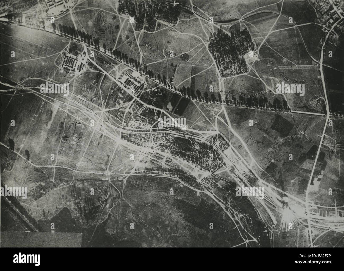 This photograph shows a direct hit on an enemy railway located behind ...