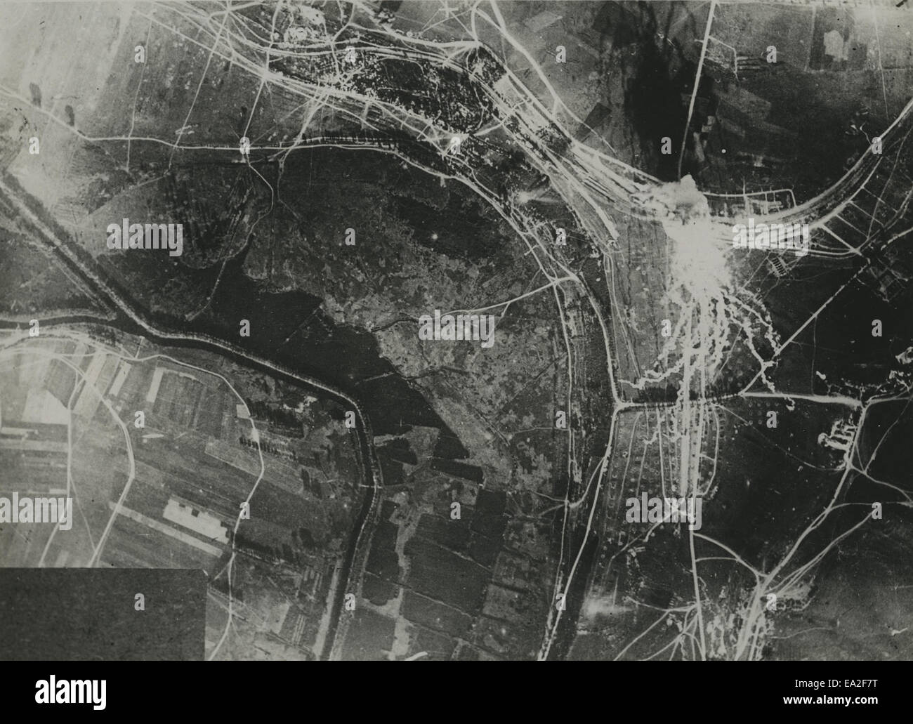 A powerful photograph from the First World War showing a direct hit on ...
