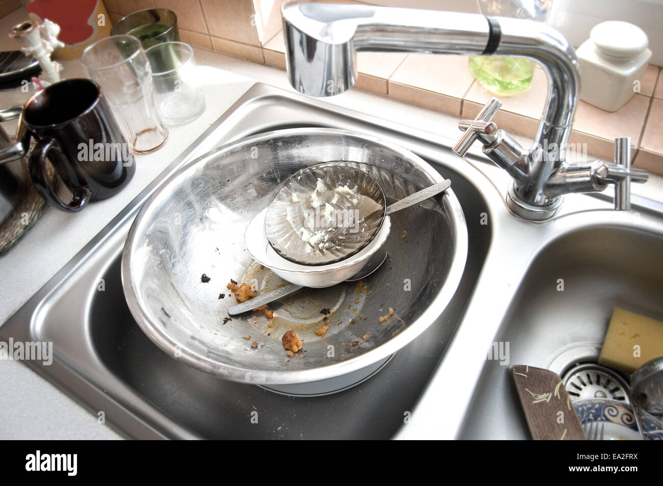 Kitchen conceptual image. Dirty sink with many dirty dishes Stock Photo ...