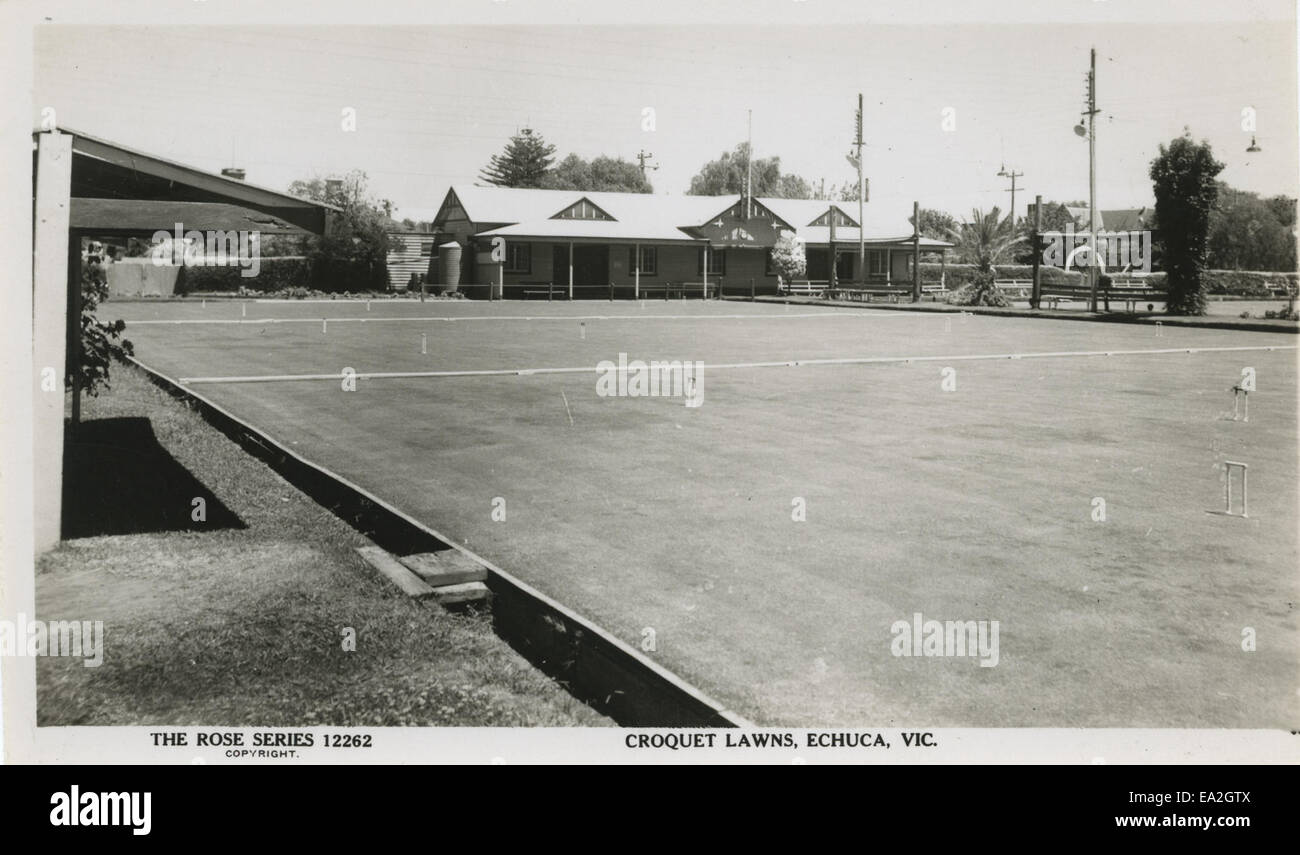 A photograph showing well-maintained croquet lawns, offering a glimpse ...