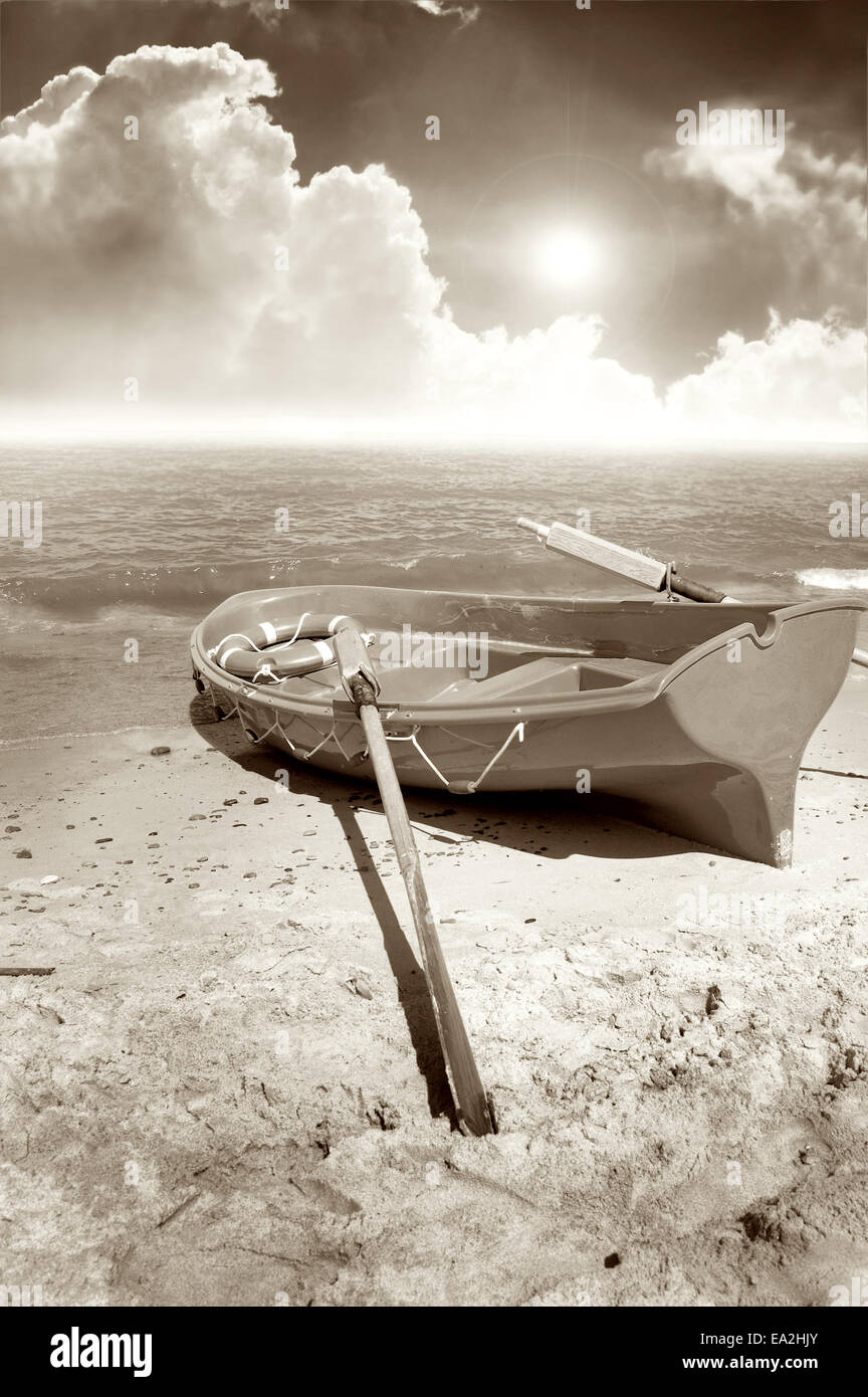 Small fishing boat in the beach. Sepia picture Stock Photo - Alamy