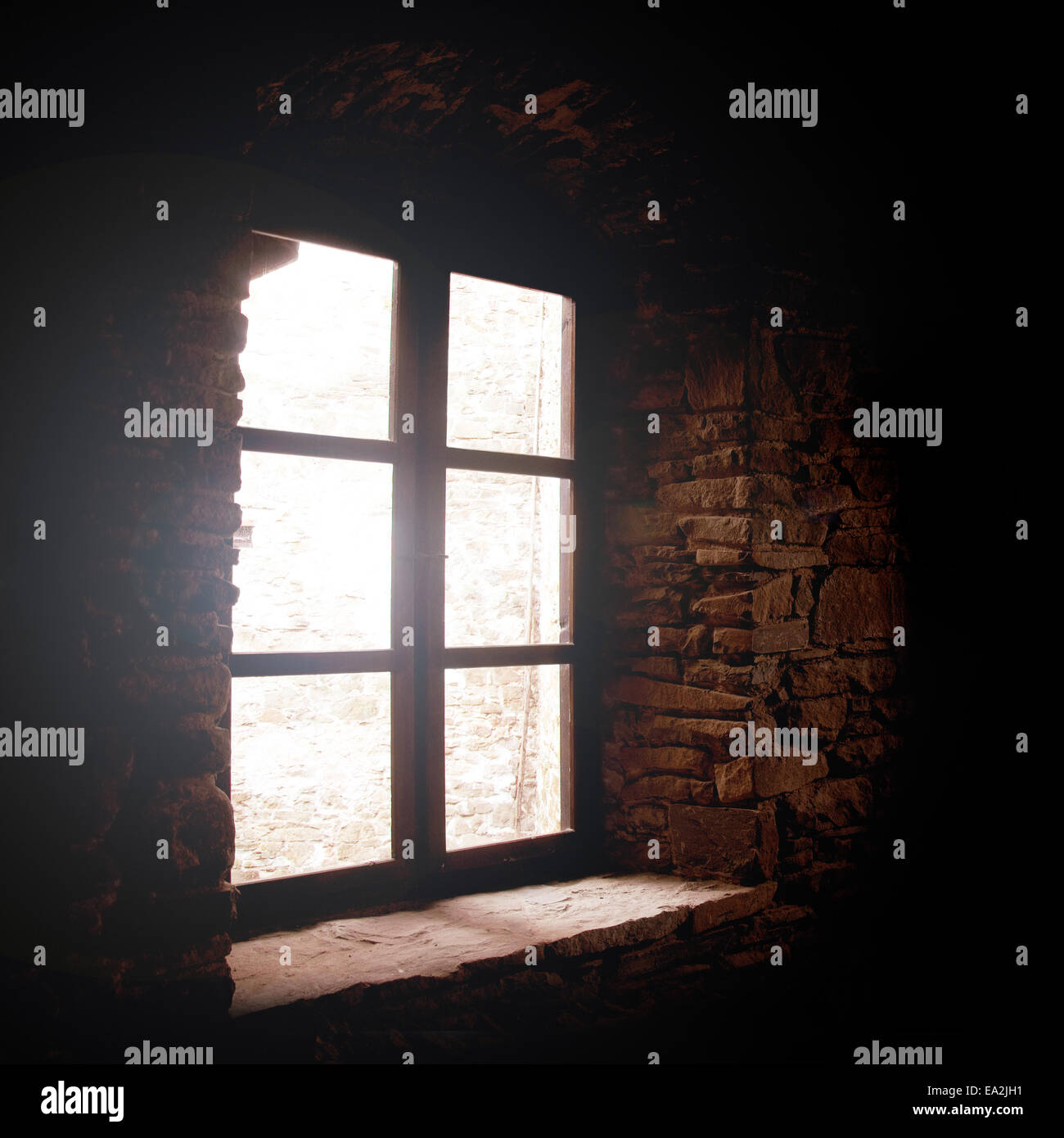 Old medieval window in dark room Stock Photo - Alamy