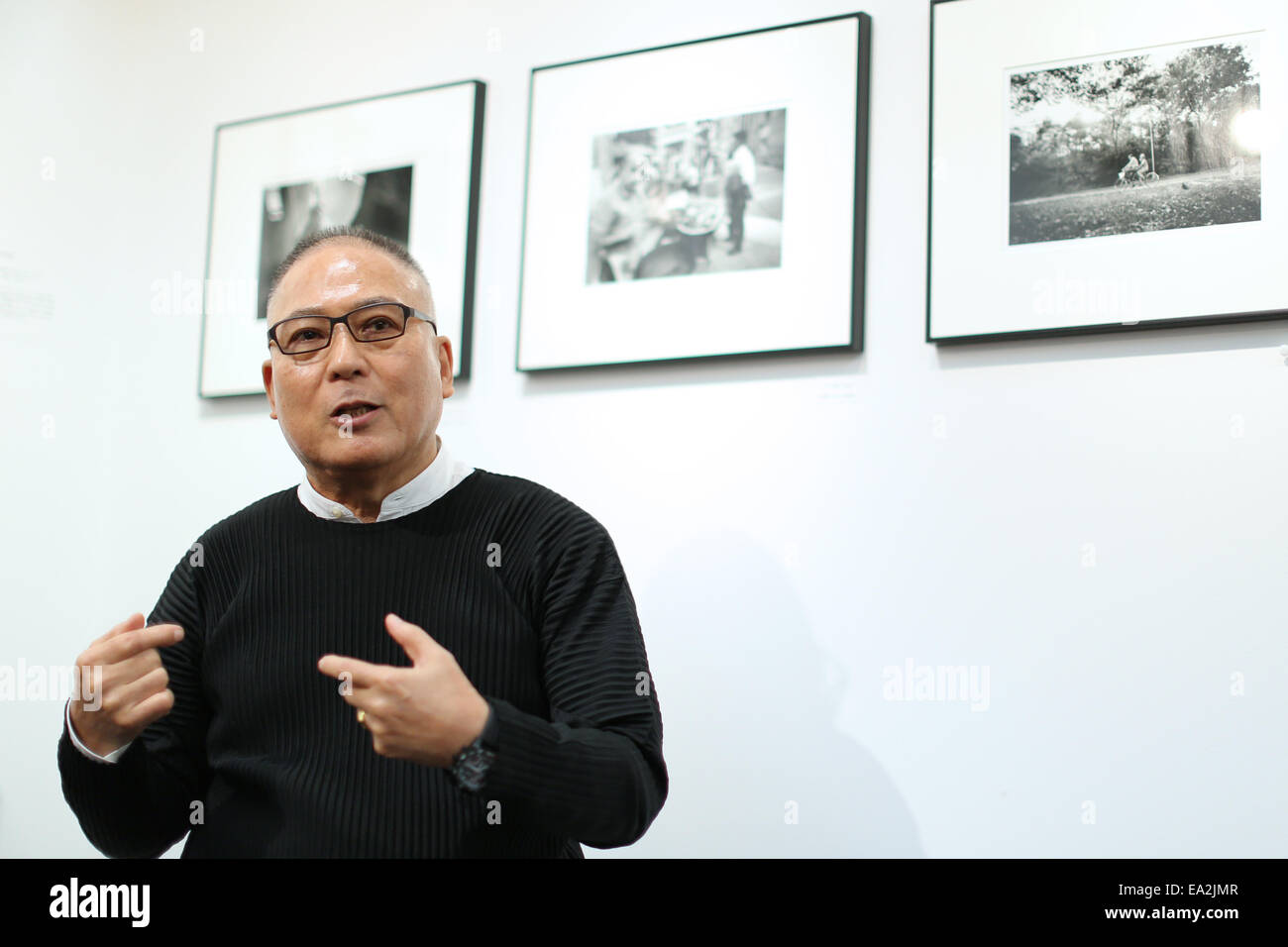 Photographer Tenmei Kano speaks during a talk session at his photo ...