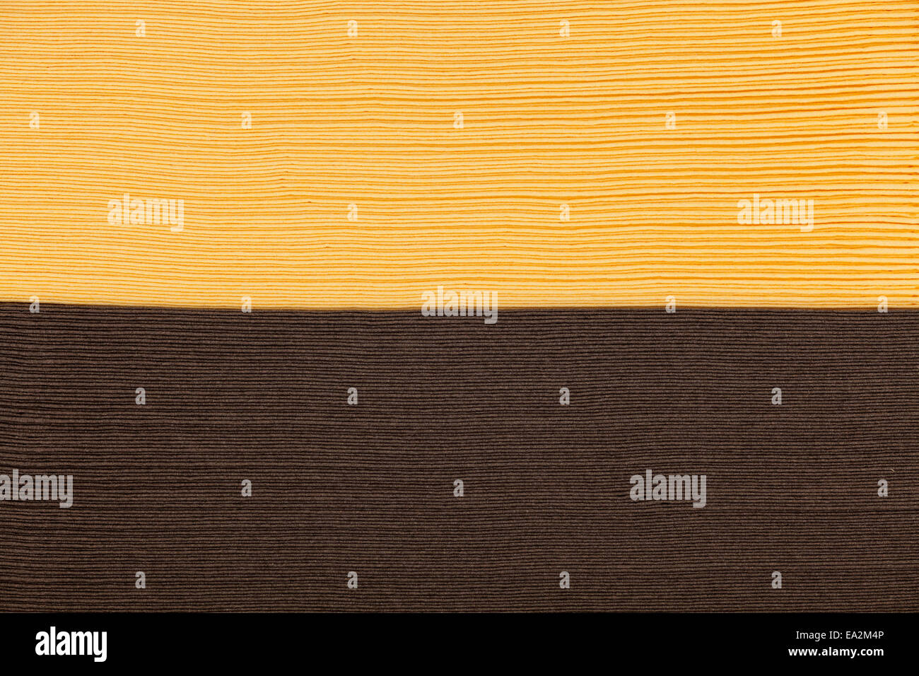 Stack of yellow and brown napkin paper closeup texture Stock Photo - Alamy