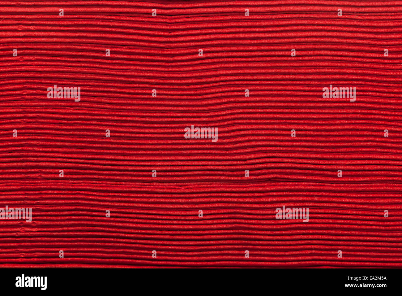 Stack of red napkin paper closeup texture Stock Photo - Alamy