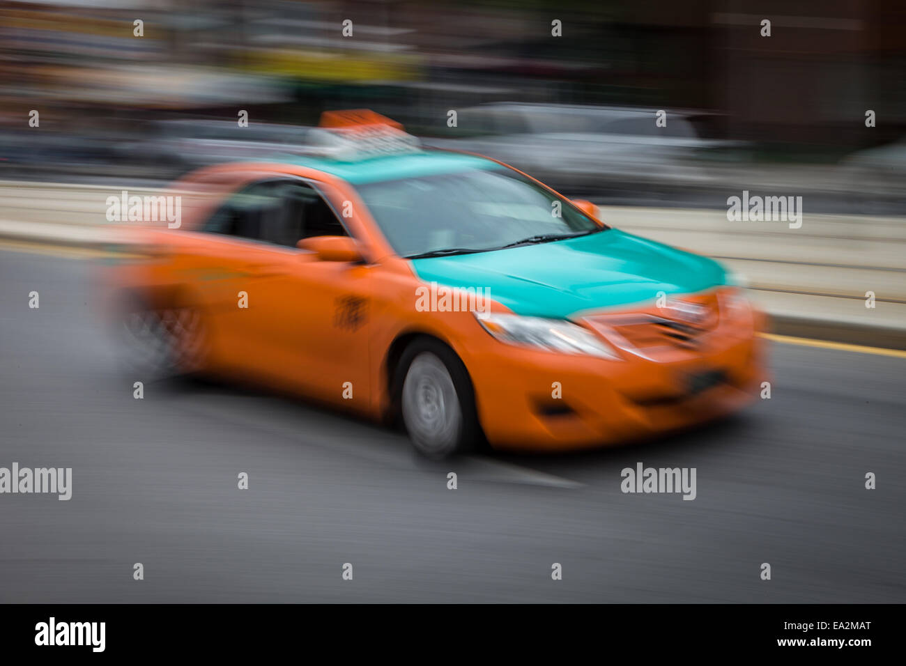 Taxi cab racing down busy street Stock Photo - Alamy
