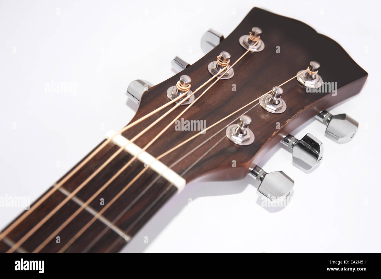 Music conceptual image. Close up of acoustic guitar neck on white ...