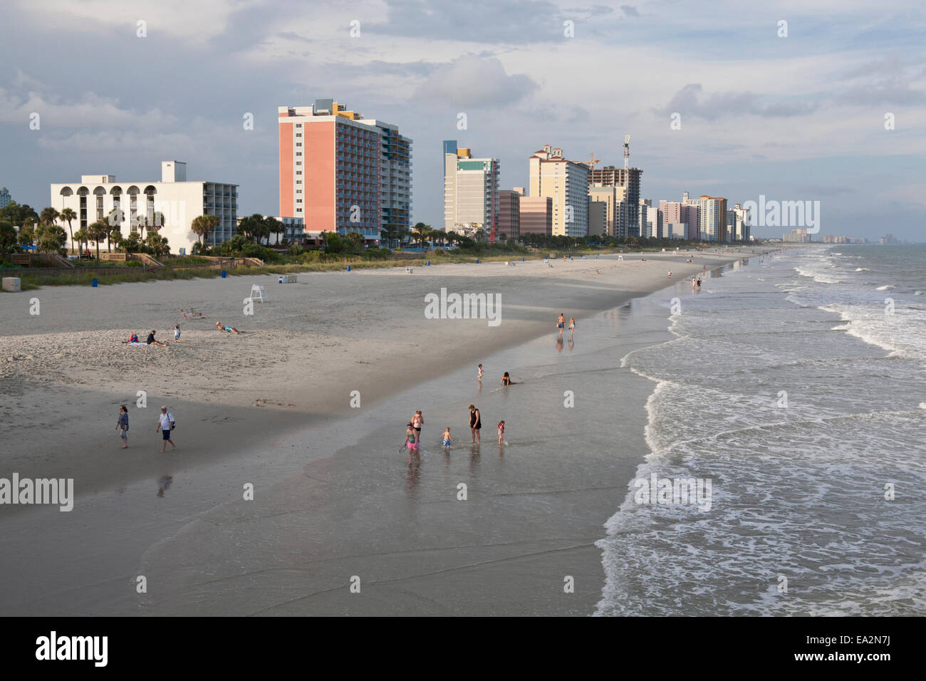 Myrtle Beach shoreline with boardwalk and hotels in the background and ...