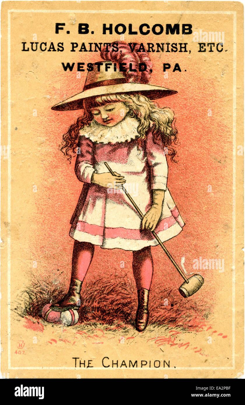 This image captures a moment in the sport of croquet, focusing on a ...