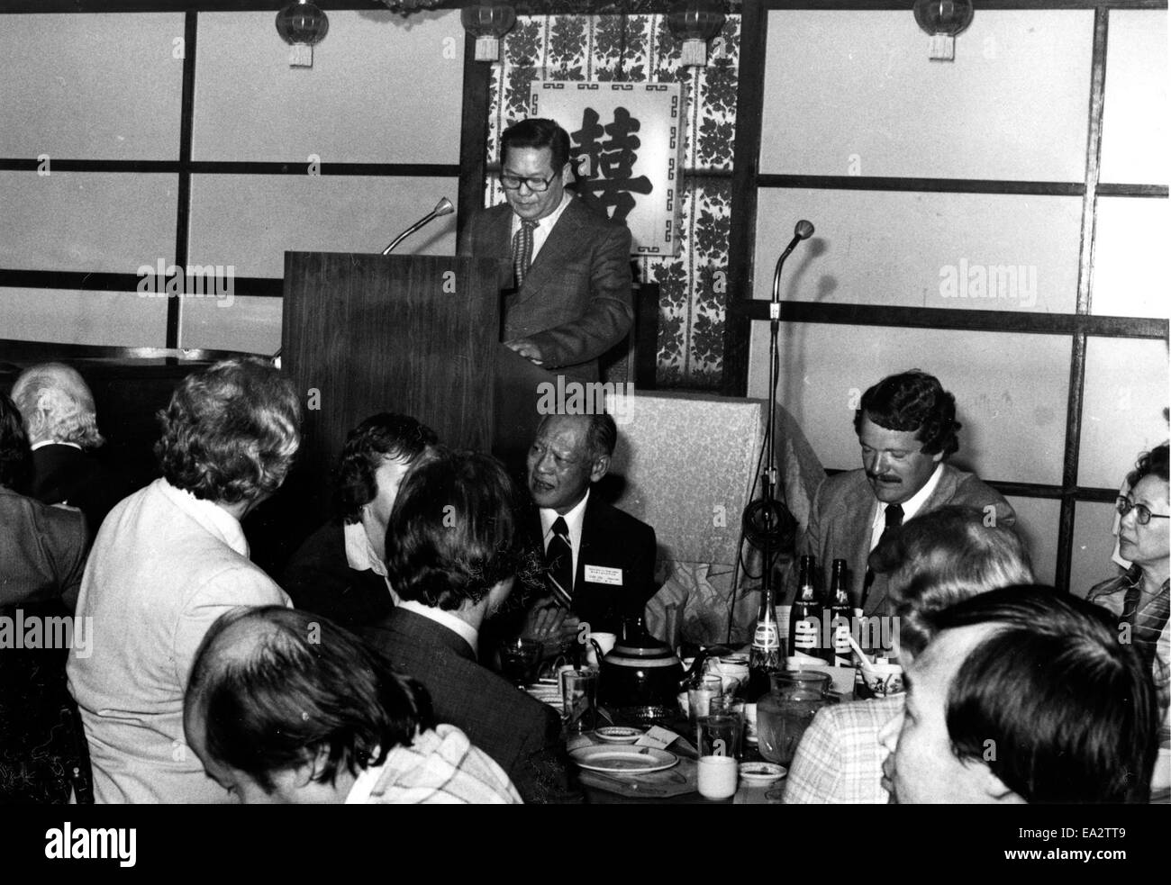 Photograph of a group of people attending a Chinese community event ...