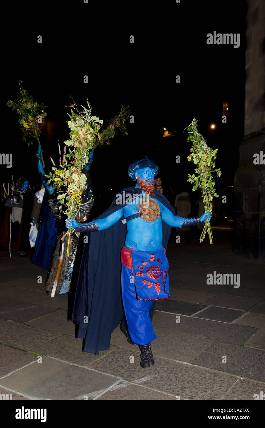 Blue-painted man taking part in the Samhuinn Fire Festival in Edinburgh ...