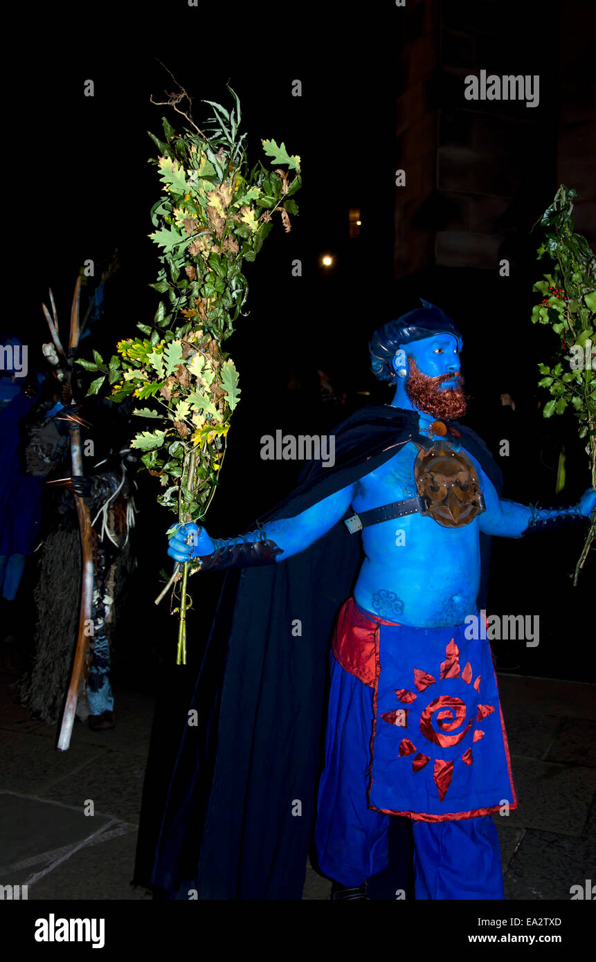 Blue-painted man taking part in the Samhuinn Fire Festival in Edinburgh ...