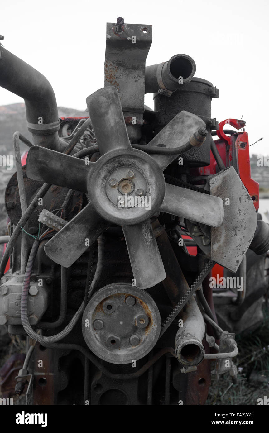 Old engine rusting away in a scrapyard Stock Photo - Alamy