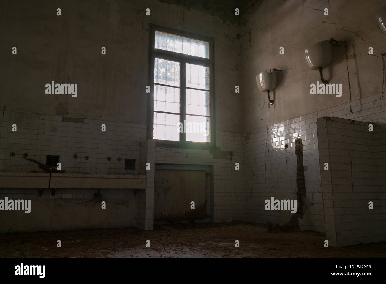 Interiors of an abandoned madhouse in the downtown Stock Photo - Alamy