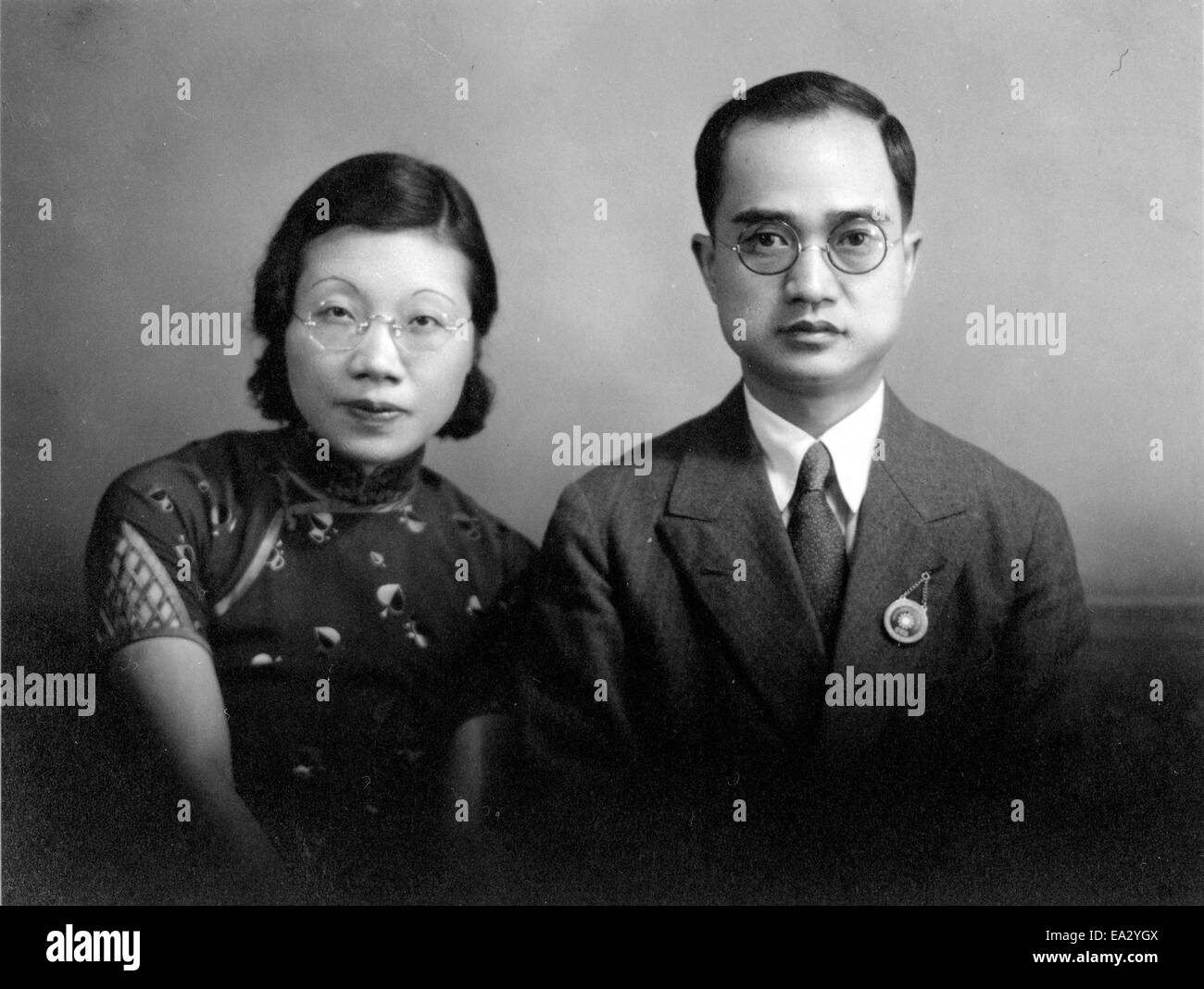 This portrait features Suzanne and Chik Yip, two figures captured in a ...