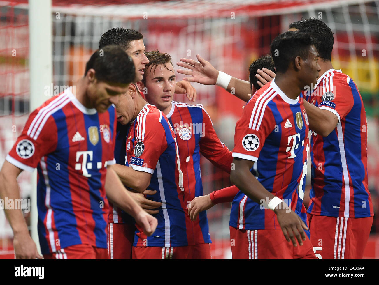 Munich, Germany. 05th Nov, 2014. Munich's Mario Goetze (3-L) celebrate ...
