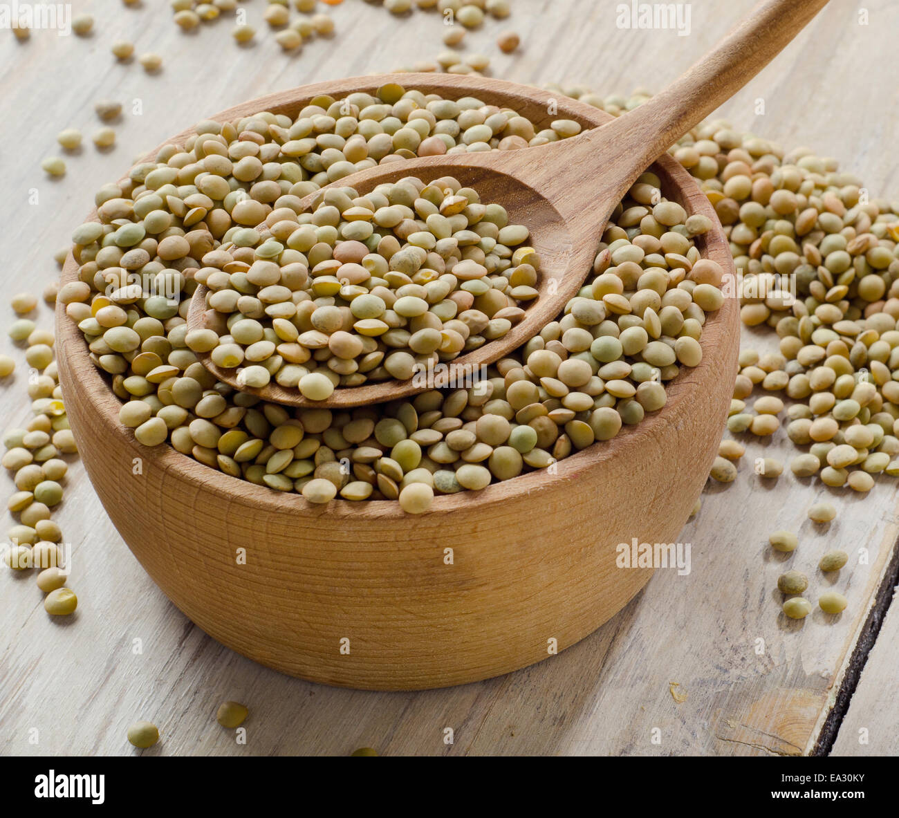 lentils on a wooden table . selective focus Stock Photo - Alamy