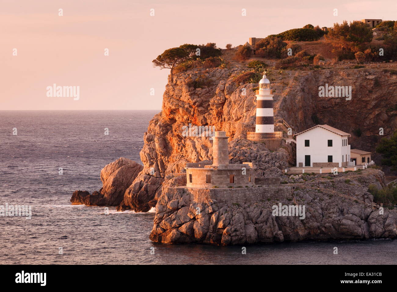 Lighthouse Far de sa Creu at sunset, Port de Soller, Majorca (Mallorca ...